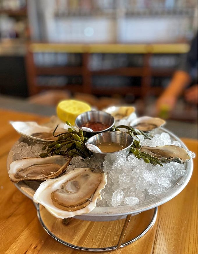 These oysters aren't just served—they're presented like the jewelry of the sea they are. The mignonette and cocktail sauce? Consider them the perfect accessories.