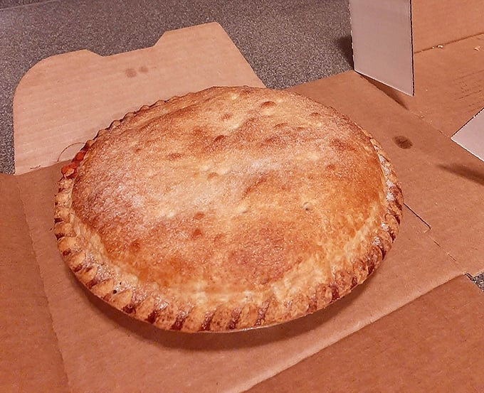 A golden-crusted peach pie that captures Ohio summer in every bite. No Instagram filter required for this natural beauty.