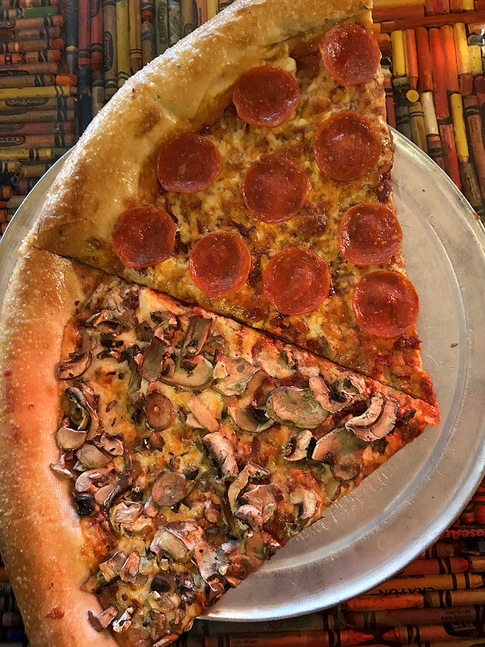 The perfect pizza slice doesn't exi— wait, is that pepperoni playing harmony with mushrooms on a stage of melted cheese?