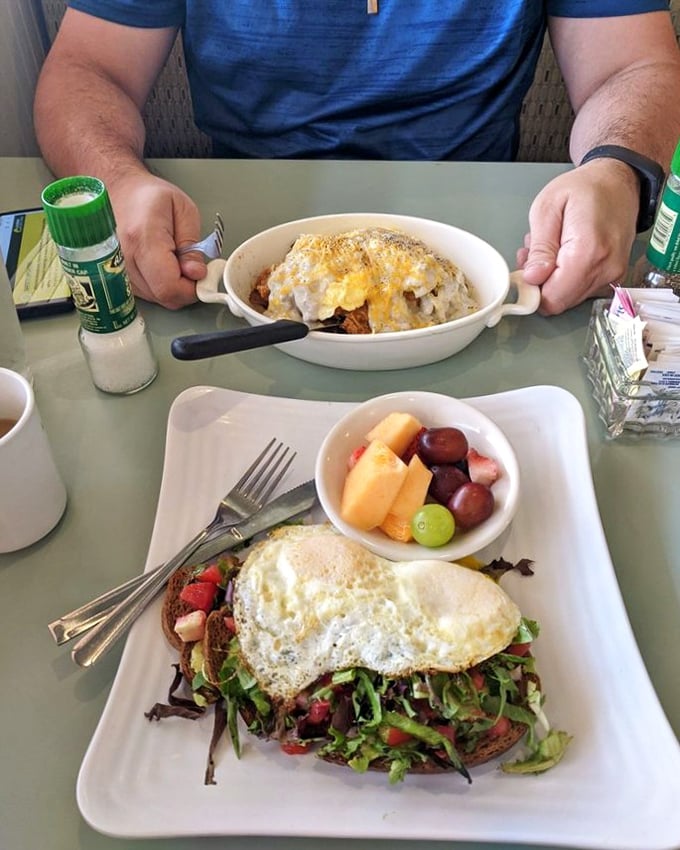 A breakfast duet that hits all the right notes. The fruit cup isn't an afterthought—it's the palate cleanser between bites of savory perfection. 