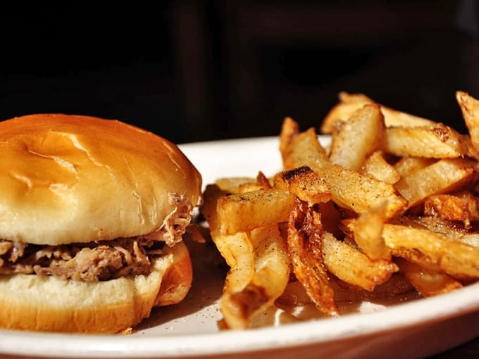 The humble barbecue sandwich – proof that sometimes the best things in life come between two pieces of bread with a side of crispy fries.