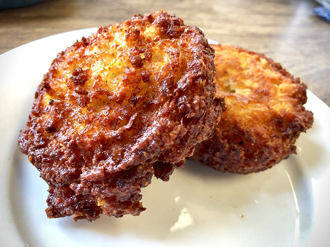 Golden-brown potato cakes that look like they've been kissed by the sun gods—crispy exterior, pillowy interior, completely irresistible.