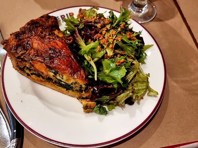 A proper quiche that would make Julia Child smile—golden, puffy, and proudly displaying its credentials as authentic French comfort food.