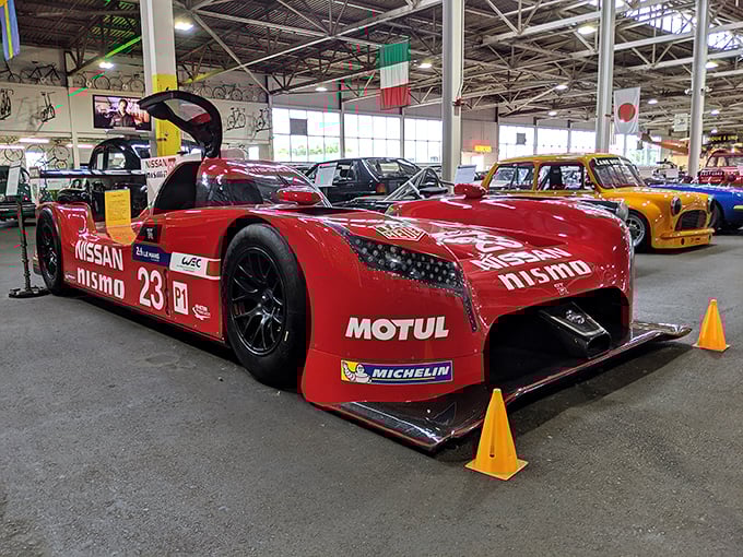The Nissan GT-R LM Nismo race car—proof that even in our modern era, designers still create machines that look impossibly fast standing completely still.