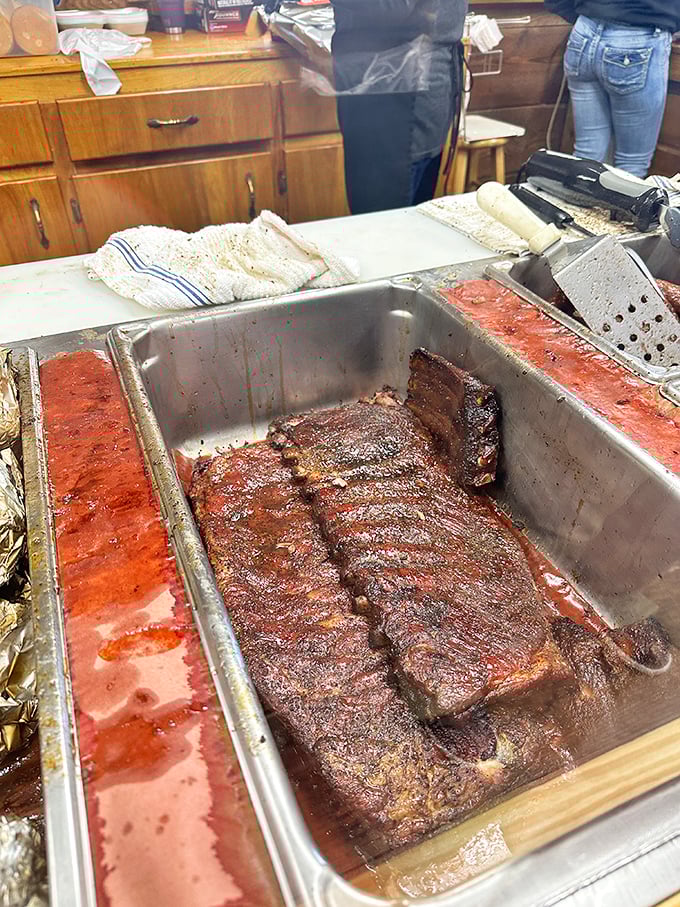 The butcher's counter at Snow's is where meat dreams come true – each tray a canvas for the smoky masterpiece that awaits.