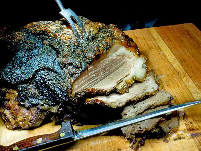 Roast pork that's been slow-cooked to the point where it practically surrenders to your fork – carnivore nirvana on a cutting board.