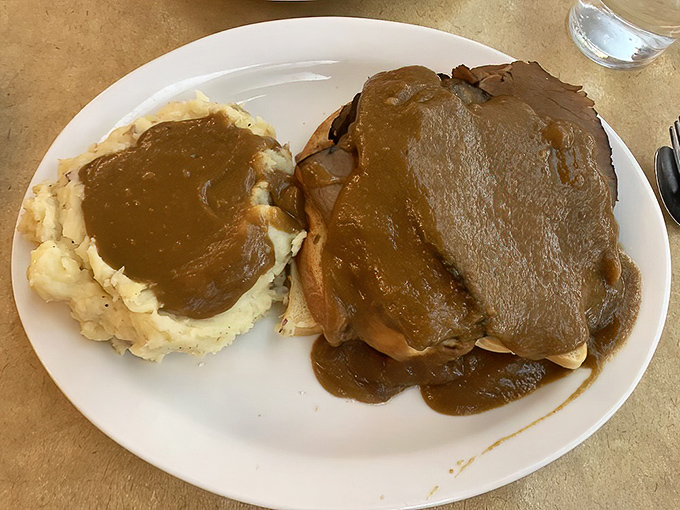 Roast beef and mashed potatoes under a gravy lake—the comfort food equivalent of being wrapped in your grandmother's quilt.