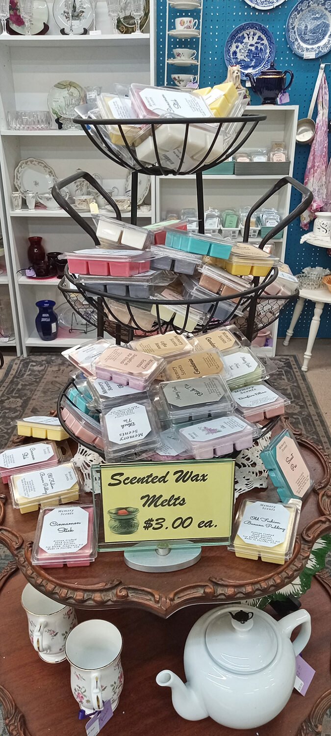 A tiered display of scented wax melts brings aromatherapy to antiquing—because treasure hunting should engage all five senses.