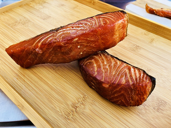These smoked salmon fillets have the kind of mahogany glow that makes you want to write poetry or at least take an embarrassing number of photos.