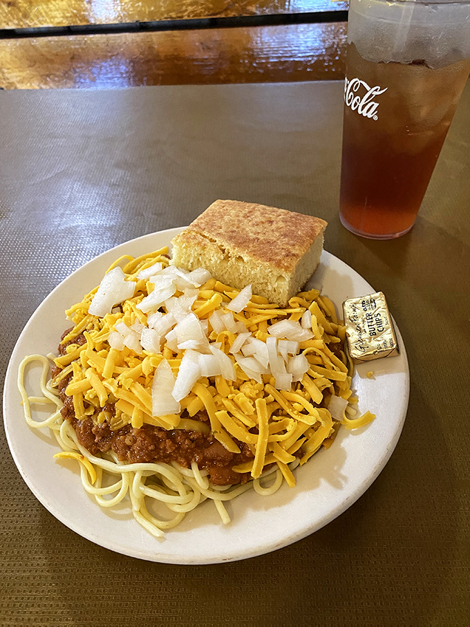 Cincinnati-style spaghetti topped with cheese and onions—where pasta meets chili in a romance that would make Romeo and Juliet jealous.