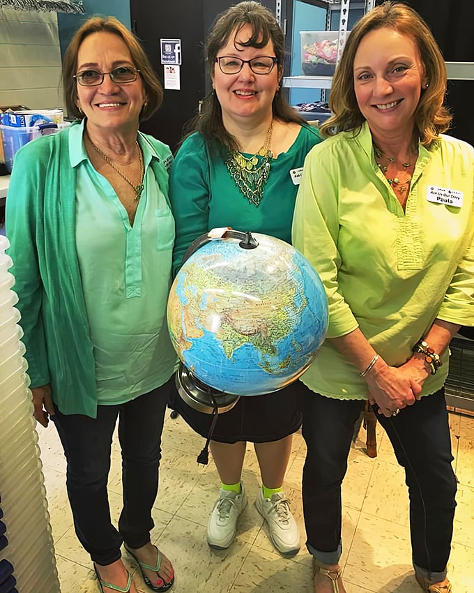 The globe isn't just for show—it's pointing to all the places you can travel with money saved from shopping here.