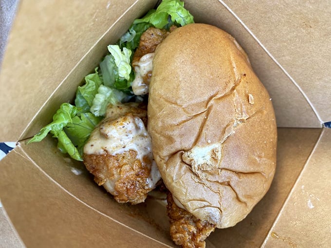 This chicken sandwich isn't just lunch—it's a masterclass in texture. Crispy exterior, juicy interior, and that bun? Pure pillowy perfection.