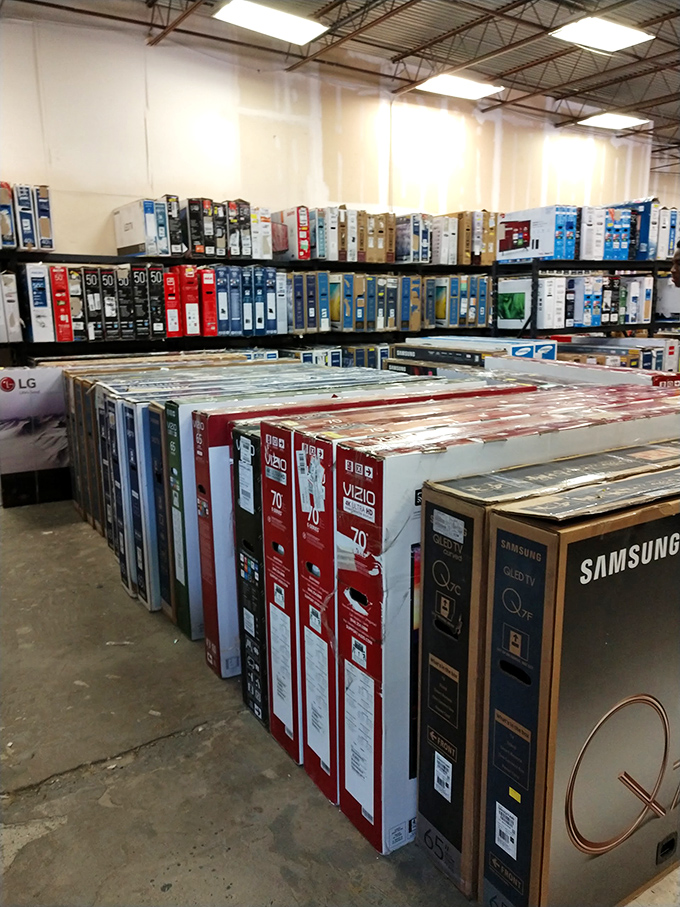 Television heaven! These flat-screens are lined up like contestants in a beauty pageant, each vying for a spot in your living room.