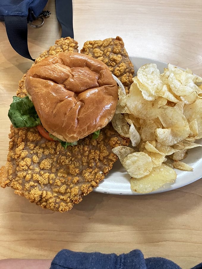 The Texas Tenderloin sandwich has clearly never heard of "portion control," and thank goodness for that. Those chips aren't sidekicks—they're necessary reinforcements.