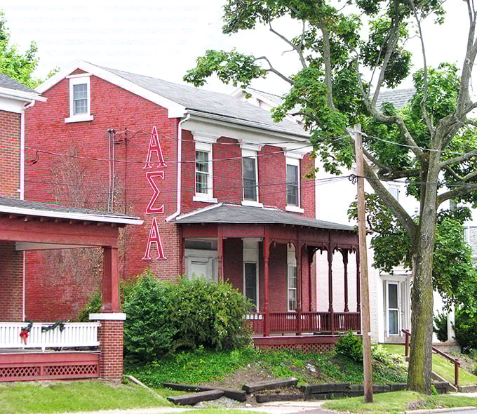 This crimson fraternity house has hosted more college memories than most students care to remember—or perhaps can remember.