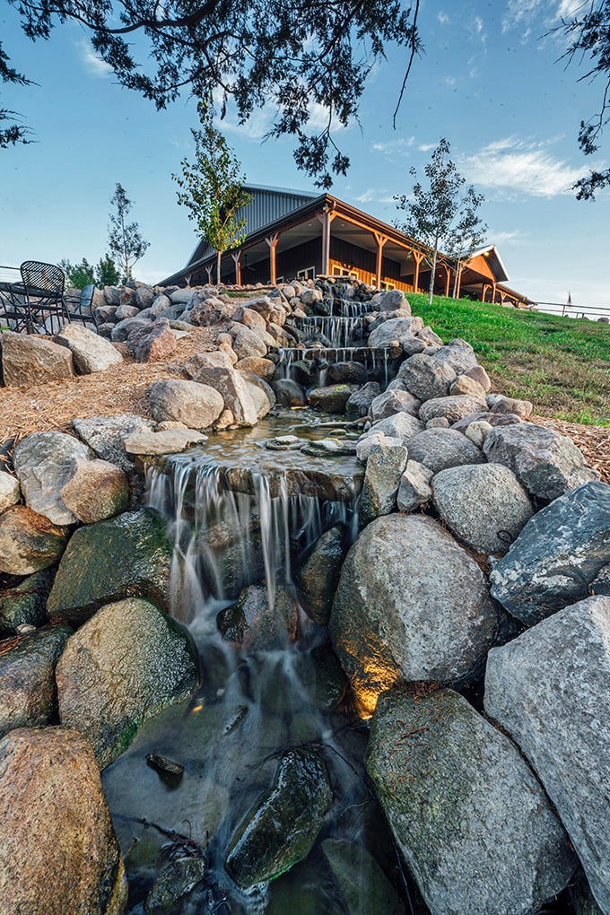 Mother Nature showing off with this picturesque waterfall at The Junto Winery – where conversations flow as smoothly as the cascading water.