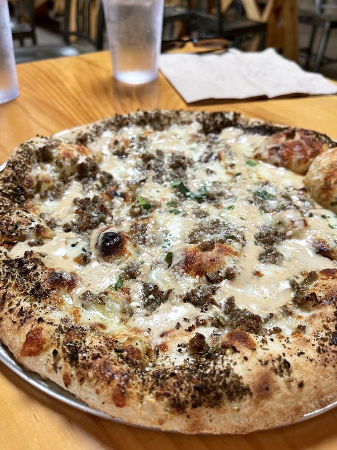 White pizza wizardry that proves tomato sauce isn't always necessary. Like a great jazz musician, this pie knows when to add notes and when to let ingredients shine solo.