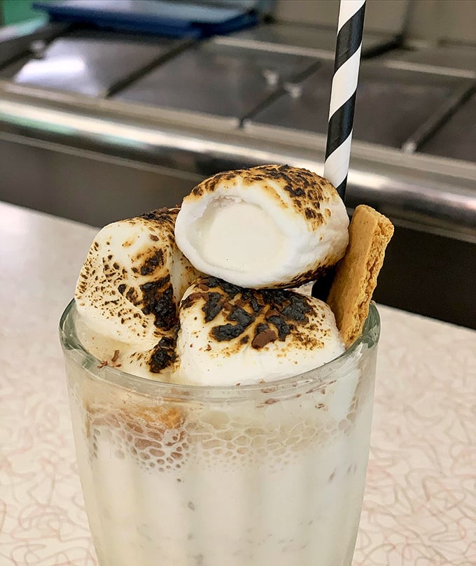 Not just a milkshake but a marshmallow adventure – with flames involved! Who said diner desserts couldn't be dramatic?