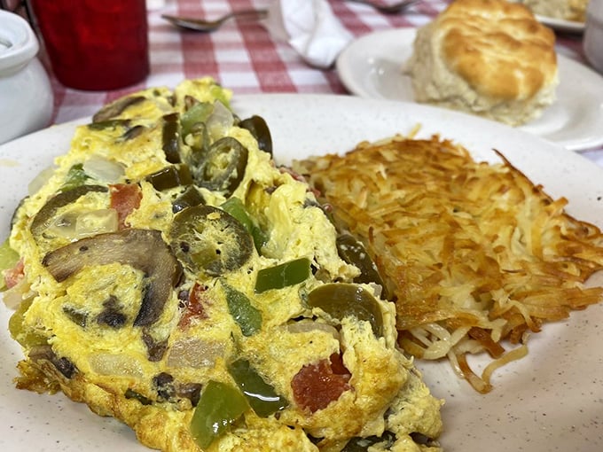 This veggie omelet is where eggs go to meet interesting friends—jalapeños and mushrooms throwing a little breakfast party.