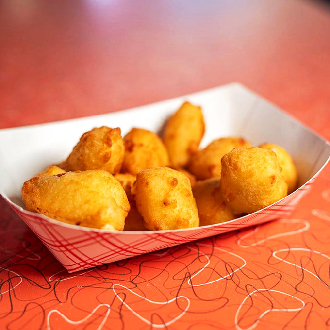 White cheddar cheese nuggets: Wisconsin's version of gold mining. Each bite delivers that perfect cheese pull that would make Instagram influencers weep with joy.