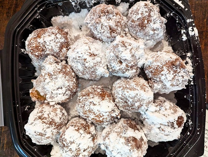 Apple fritters dusted with powdered sugar like fresh Pennsylvania snow. Diet plans have been known to mysteriously disappear at first bite.