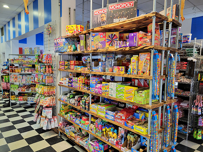 Industrial shelving never looked so inviting—stacked with boxed candies in a kaleidoscope of colors that would make Willy Wonka himself nod in approval.