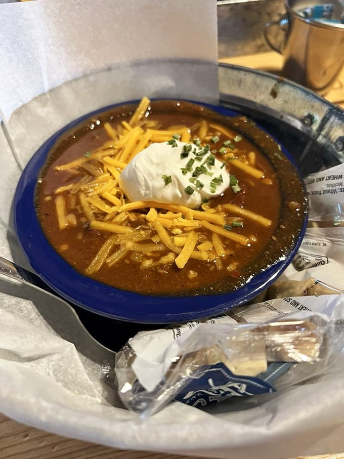 A bowl of chili that's seen things – topped with cheese, sour cream and chives, it's the perfect remedy for a chilly Boundary Waters morning.