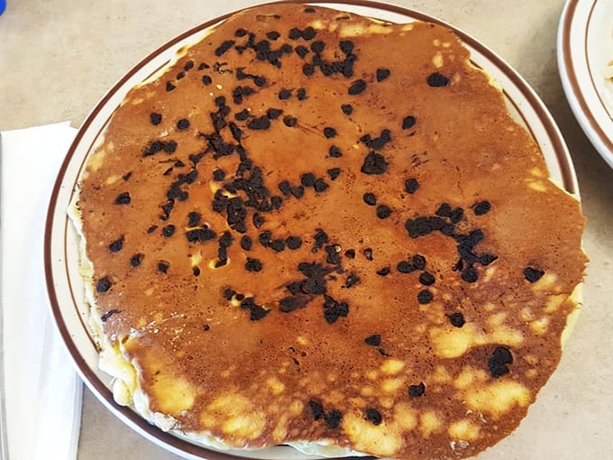 Chocolate chip pancakes that spark joy with each bite—like finding money in your winter coat, but tastier.