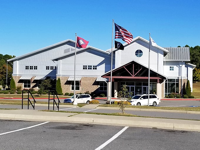 The community center flies its flags with pride. In Heber Springs, "community" isn't just part of the building's name – it's the town's operating system.