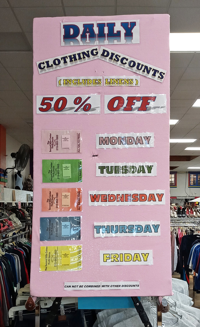 The pink discount board—a roadmap to savings that regulars memorize like subway schedules, planning their weekly visits accordingly.