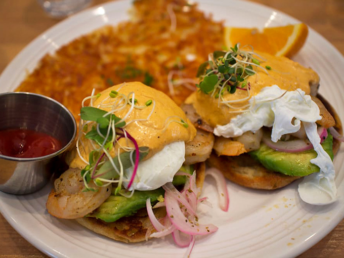 Two golden orbs of hollandaise promise the kind of morning epiphany that makes Monday feel like Saturday.