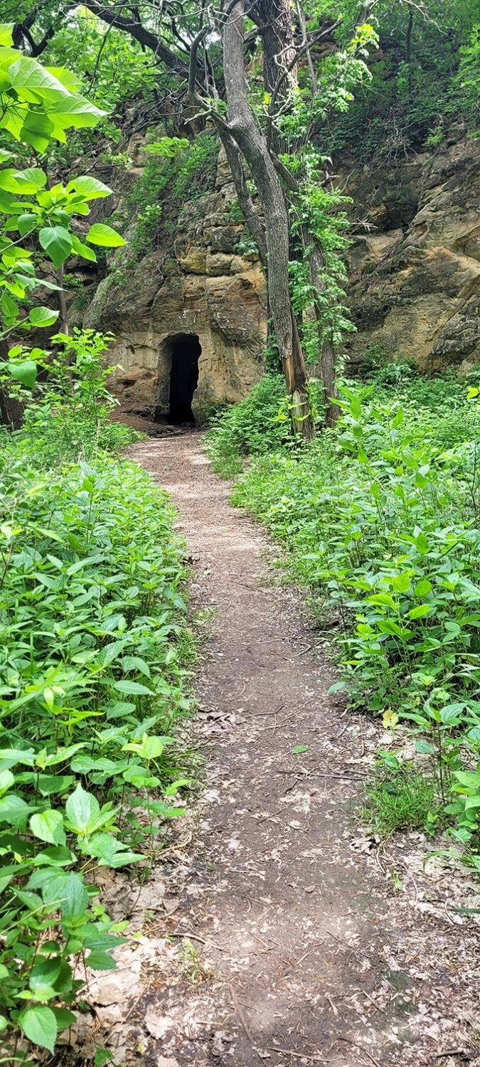 This doorway doesn't just lead into a cave—it's a time machine to when shelter meant whatever you could carve from the earth.