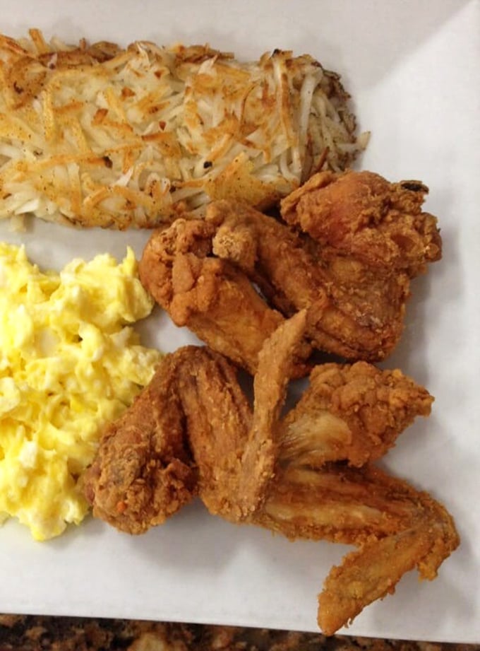 Fried chicken wings with that perfect crackle-crunch coating – the kind that makes conversation stop and eyes close in silent appreciation.