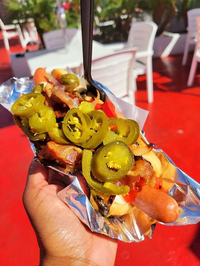 Loaded with jalapeños and enough toppings to require architectural engineering for proper consumption without spillage.