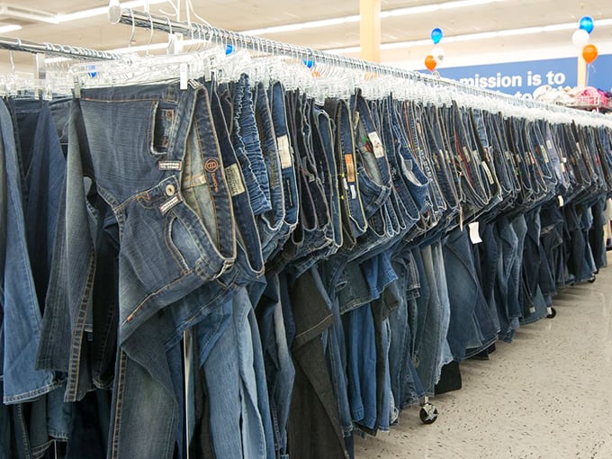 The denim rainbow—where your perfect pair of jeans awaits, already broken in by someone who decided they weren't "sparking joy."