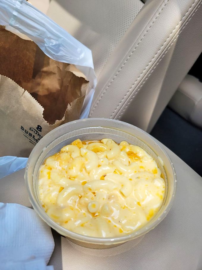 Mac and cheese so creamy it belongs in the dairy hall of fame. Car eating has never looked so justified.