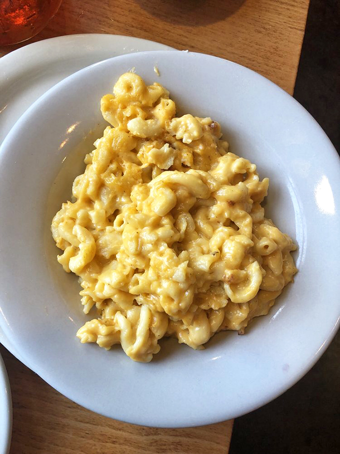 Mac and cheese so gloriously golden and creamy it could easily be the main event rather than a side—the supporting actor that steals every scene.