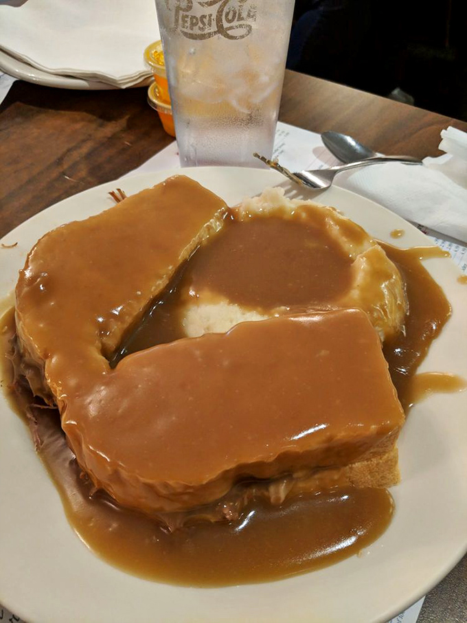Hot, open-faced sandwiches draped in gravy – when the bread exists purely as a delivery system for more gravy. Brilliant Amish engineering at work.