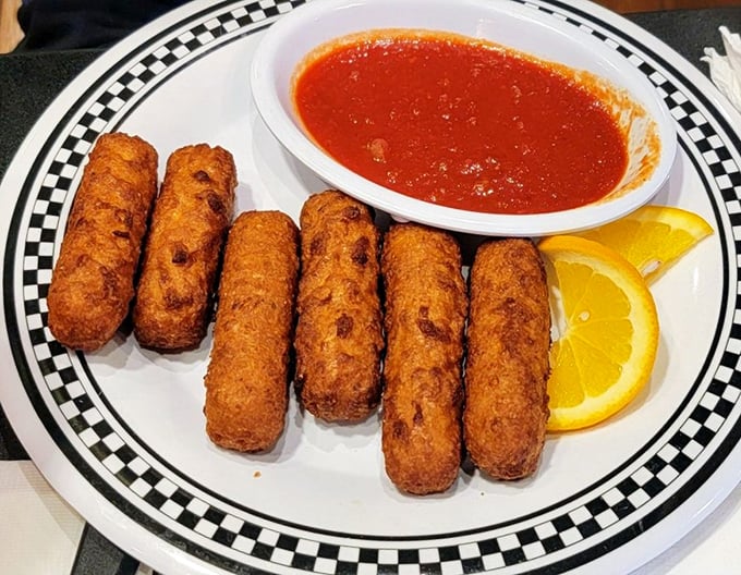 Mozzarella sticks: the diplomatic negotiators between your hunger and your patience. That marinara is ready for diplomatic relations.