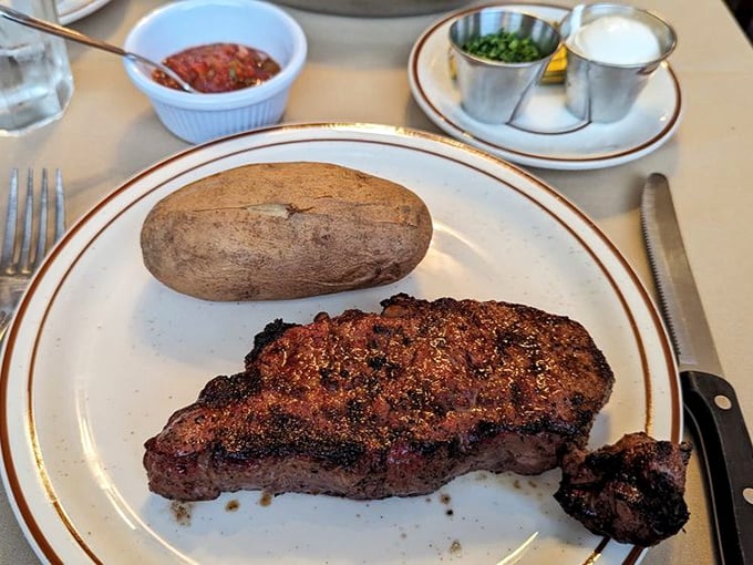 This New York steak with its baked potato sidekick is the culinary equivalent of Sinatra and Martin—a classic duo that never disappoints.