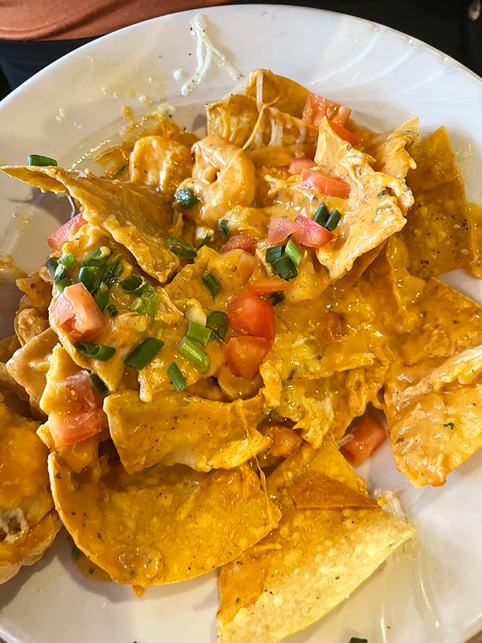 Seafood nachos that break all the rules in the best possible way – crispy chips smothered in creamy seafood goodness. 