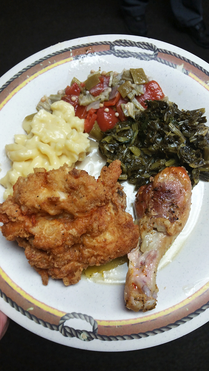 A plate that tells the whole Southern story: collard greens with just enough bite, mac and cheese that's actually cheesy, and chicken fried to perfection.