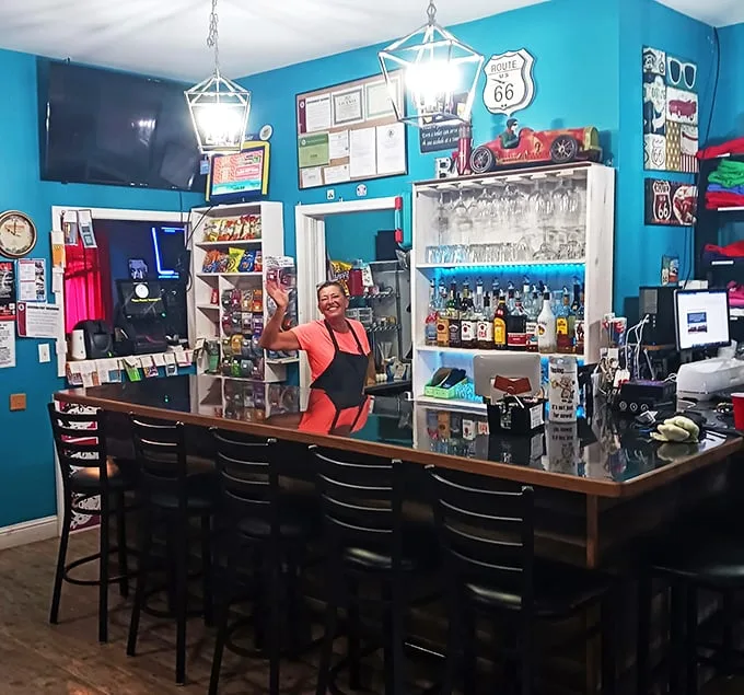 Every great roadside attraction needs a watering hole. This Route 66-themed bar area serves refreshment with a side of highway nostalgia.