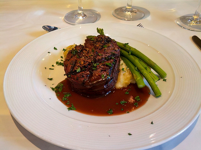 Steak and asparagus—a classic pairing that's outlasted most Hollywood marriages. The caramelized onions add a sweet note to this savory symphony.