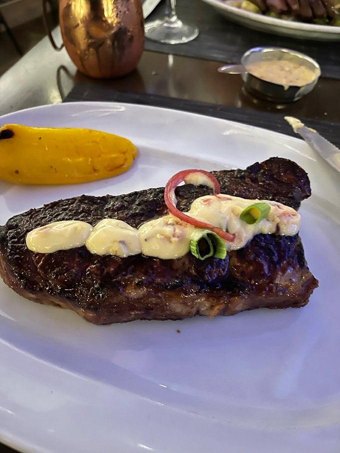 This isn't just steak—it's a masterpiece topped with butter medallions that melt into the meat like they've found their soulmate.