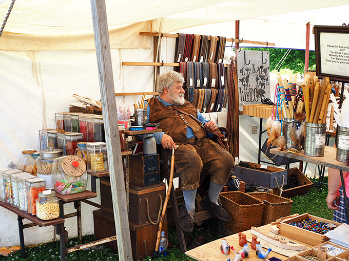 Every great market has its characters. This vendor seems as much a part of the merchandise as the wares themselves, a living piece of Indiana trading tradition.