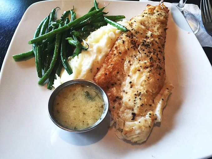 This perfectly cooked walleye proves that simplicity, when executed flawlessly, creates the most memorable dining experiences—butter sauce for the win!