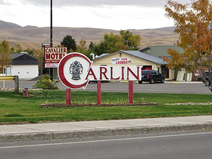 Carlin's charming railroad-themed welcome sign hints at a town where your retirement dollars stretch like the nearby desert horizon.