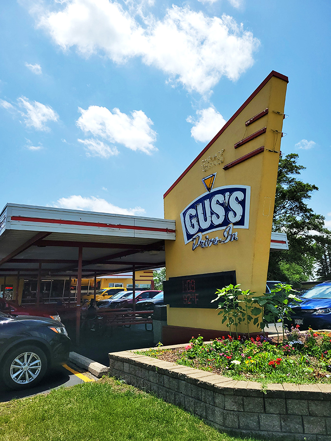Gus's Drive-In's towering yellow sign is Wisconsin's version of the North Star—if that star guided you to frozen custard instead.