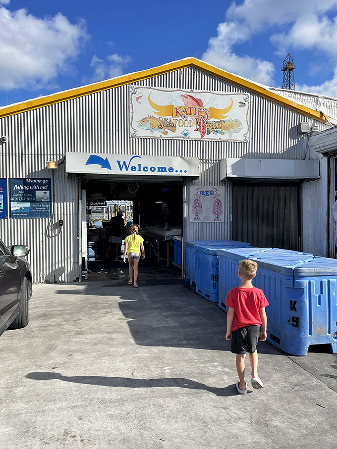 Katie's industrial charm signals serious seafood business. Those blue containers outside hold treasures fresh from Gulf waters!